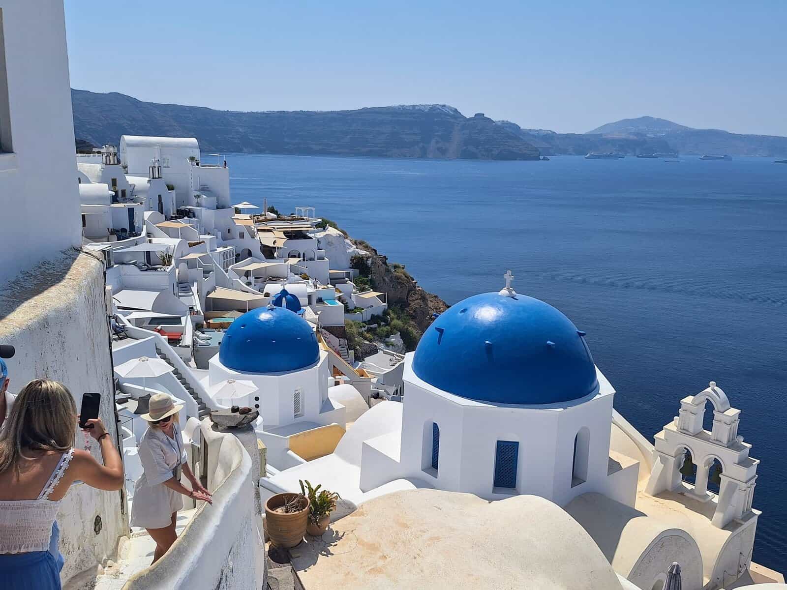 How to Find and Capture the Famous Blue Domes in Santorini - Travel Dudes